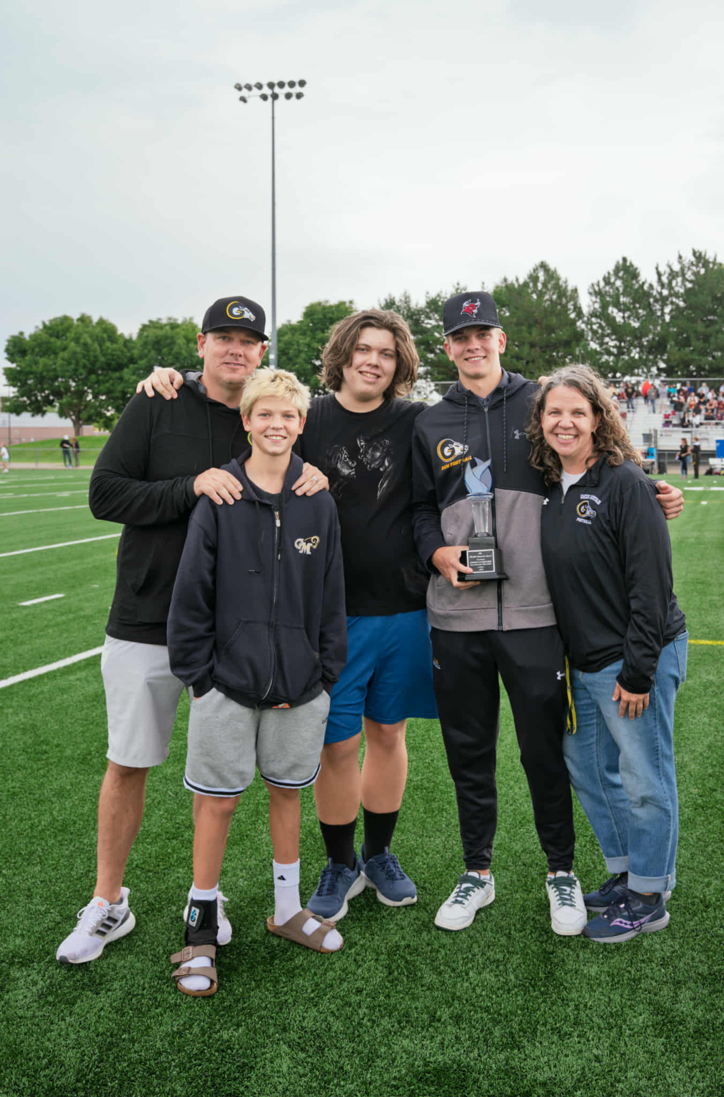 Sammy Steinmark presents Simon Lunsford with 2025 Freddie Steinmark ...